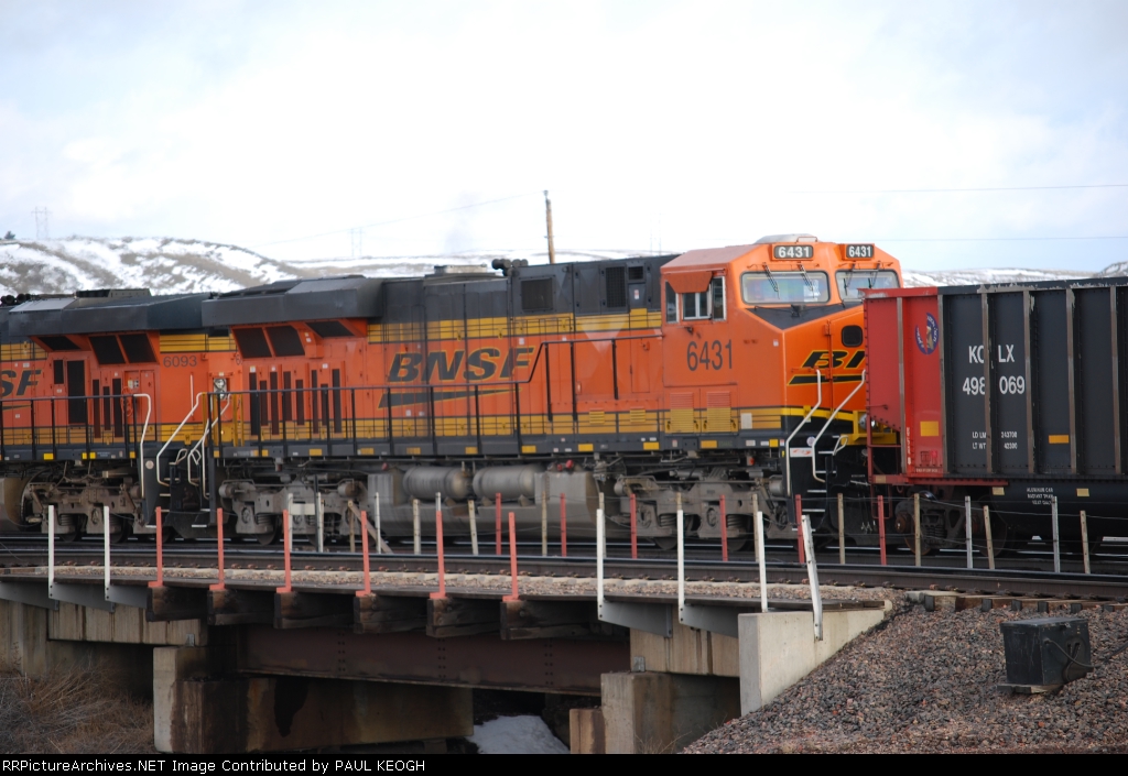 BNSF 6431 picks up the speed to make the turn south onto the Donkey Creek Y and roll thru Donkey ...